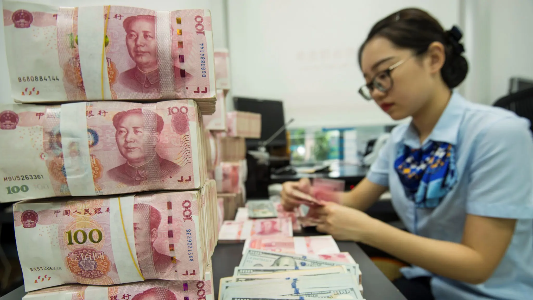 China’s yuan buckles behind a thinning line of defense | White paper ...